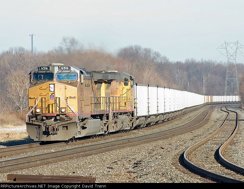UP 6516 leads Westbound CSX E958